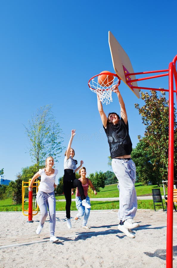 Teenagers Playing Basketball Stock Photo - Image of active, kids: 20908888