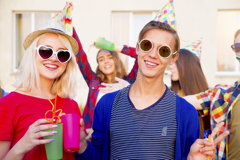 Teens having a party stock photo. Image of building - 104488934