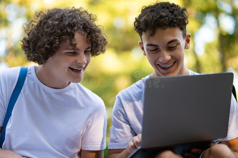 Teens Learning Lessons and Looking Involved while Reading Books Stock Image - Image of friends ...
