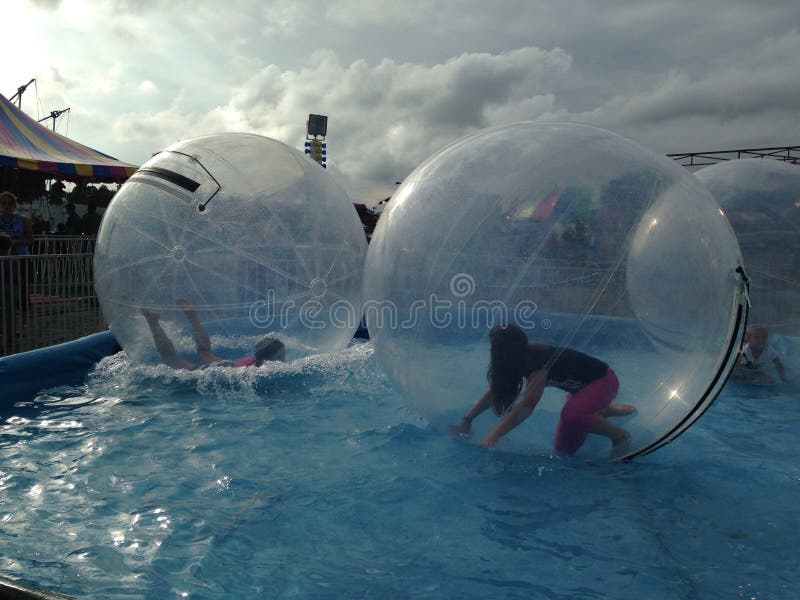 Teens Playing in Water Balls Editorial Stock Image - Image of water ...