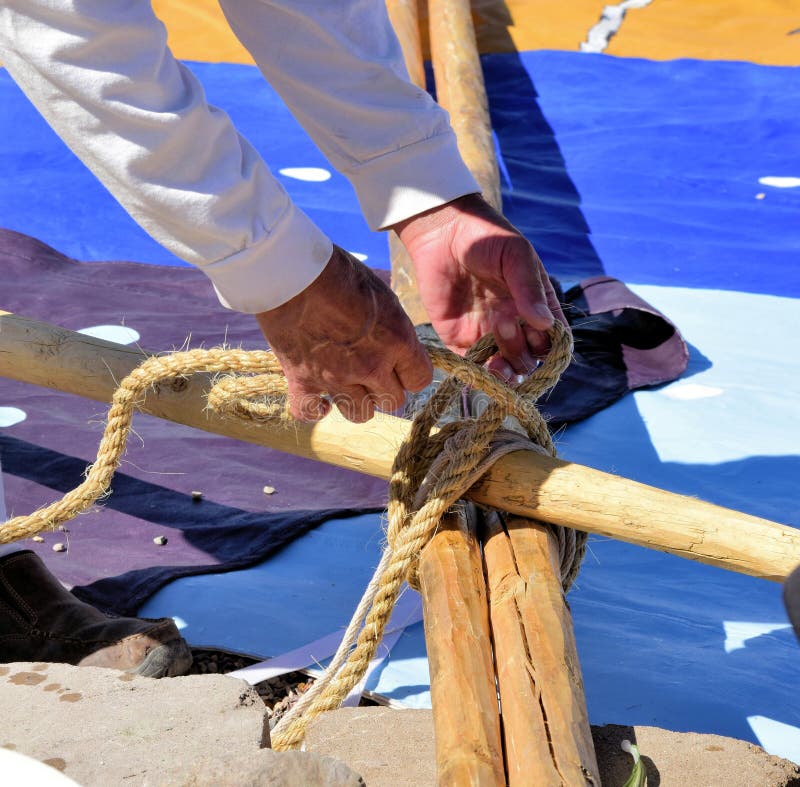 Teepee Building: Connecting the Main Support Poles. Stock Image - Image ...
