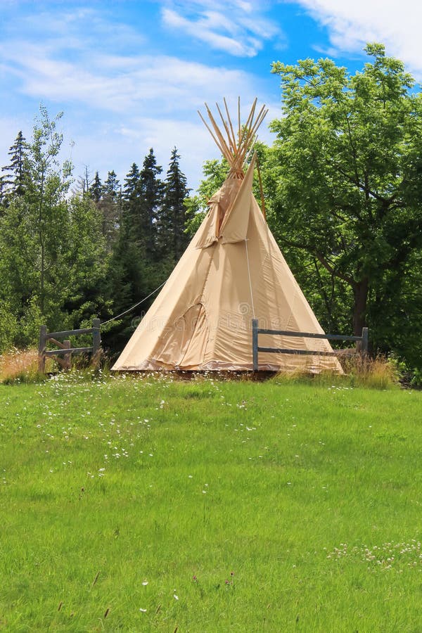 Teepee Structure for Shelter Made of Tree Branches on a Sandy Beach in ...