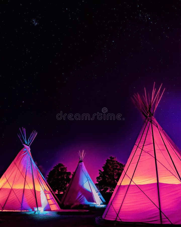 Teepees Glowing Colorfully at Night Under Stars in Marfa, Texas Stock ...