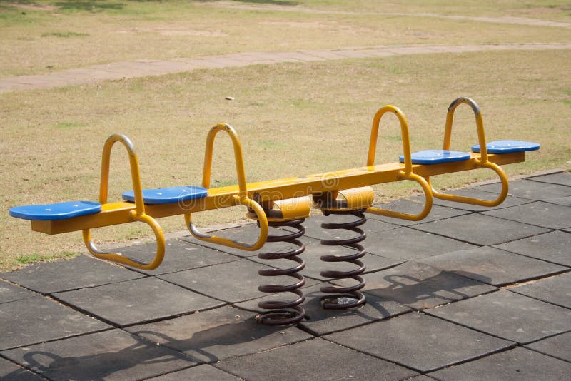 Teeter in playground stock image. Image of grass, outside - 44257767