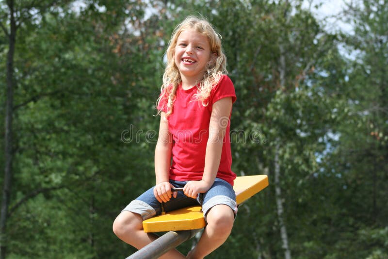 Teeter totter girl stock photo. Image of cute, play, affectionate - 3059742