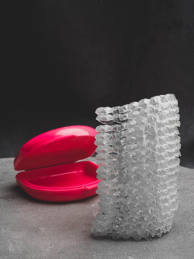 Invisalign Braces and Box on Concrete Background Stock Image - Image of ...