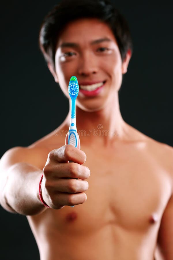 Teeth Care Young Man with Toothbrush Stock Image - Image of examining ...