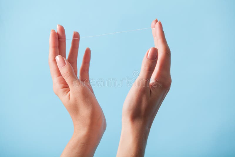 Teeth cleaning thread stock image. Image of thumb, teeth - 36638113