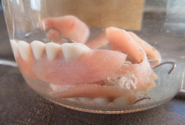 Teeth in a jar stock photo. Image of metallic, curiosity - 164857072