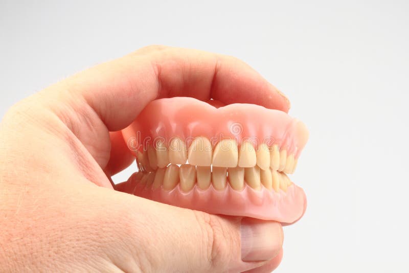 Teeth Prosthesis in the Human Hand Stock Image - Image of dentist ...