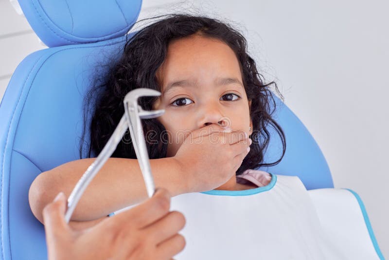 Teeth are always in Style. a Young Girl Looking Scared while Having ...