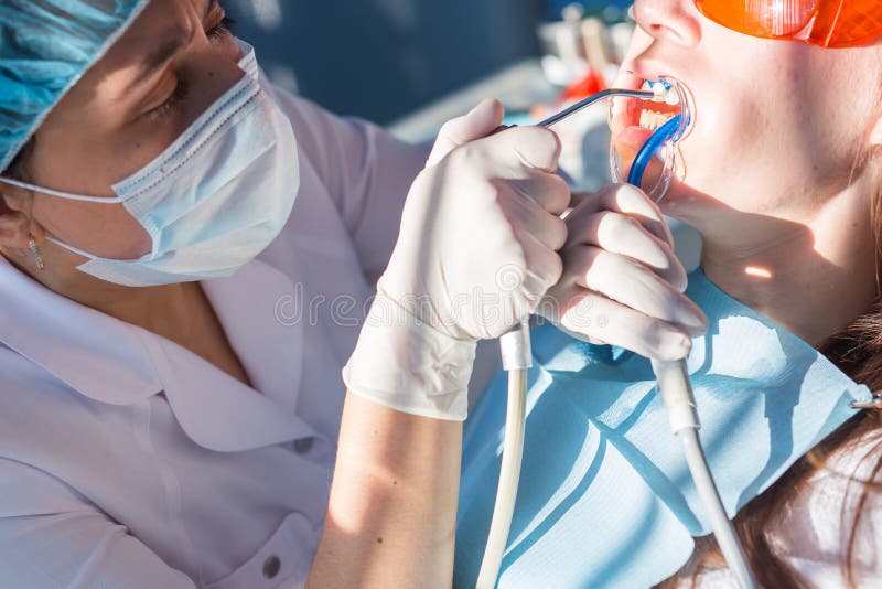 Teeth whitening procedure stock image. Image of office - 92976093