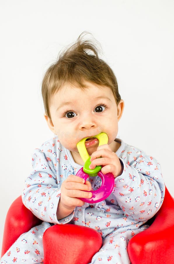 Teething baby girl stock photo. Image of happy, adorable - 76370776