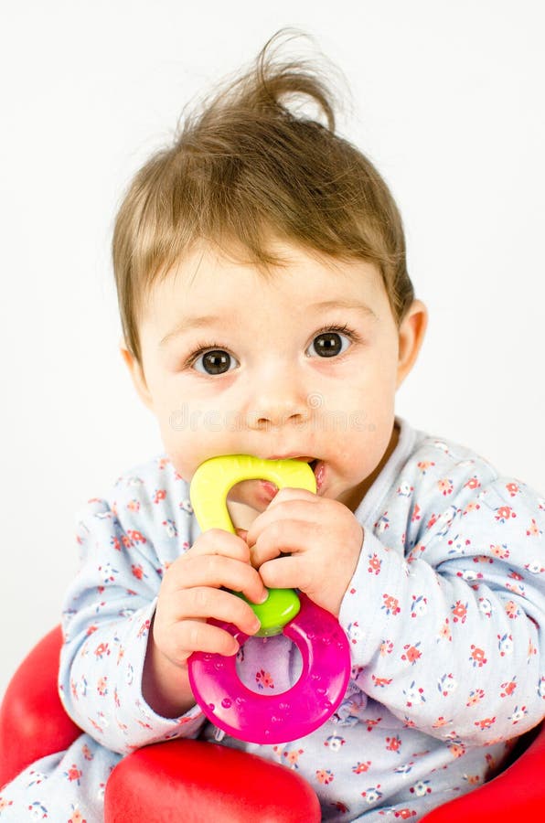 Teething baby girl stock photo. Image of pain, funky - 76370826