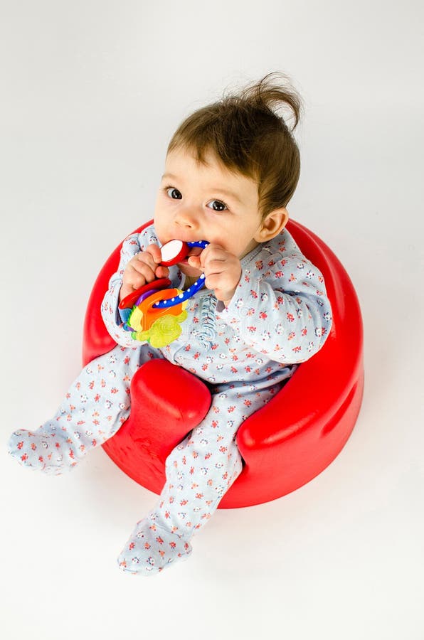 Teething baby girl stock photo. Image of seat, cute, siting - 76375830