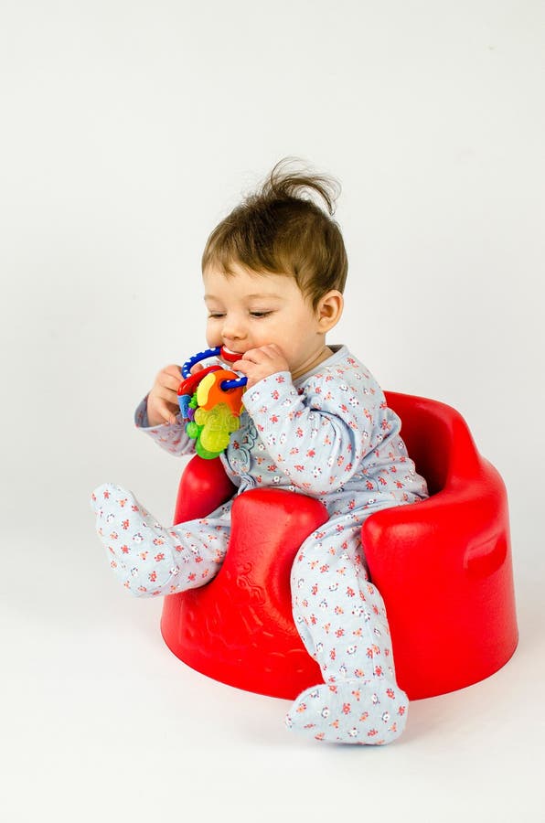 Teething baby girl stock image. Image of cheerful, growing - 76375859