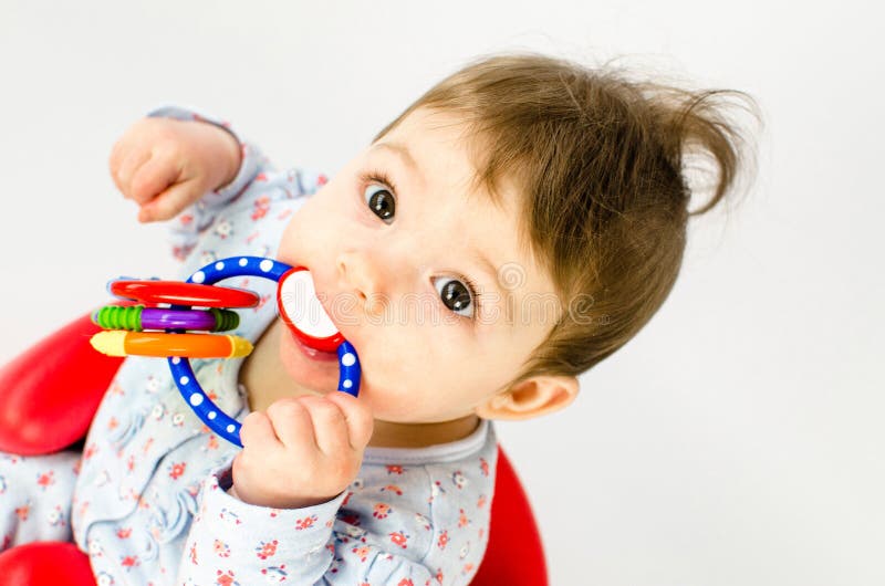 Teething baby girl stock image. Image of funny, ache - 76375861