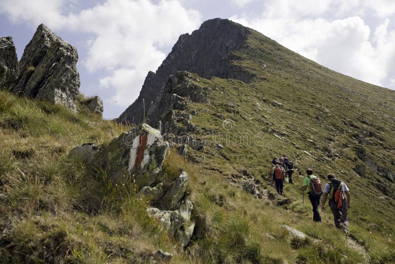 A Group of Tourists on a Mountain Ridge Stock Image - Image of hobby ...