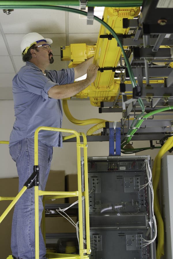 Telecom Installer on OSHA Ladder Stock Photo - Image of ...