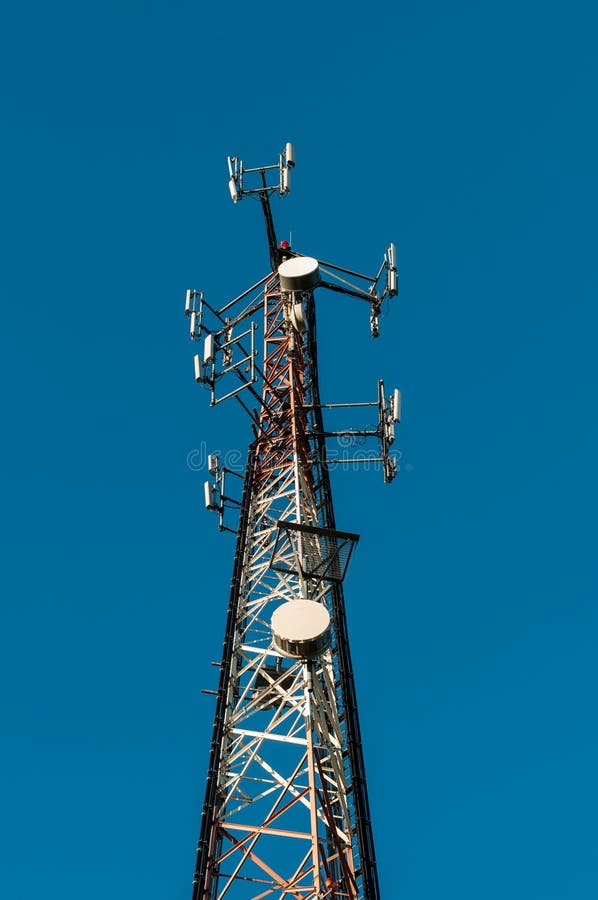 Telecom Tower Against a Blue Sky Stock Photo - Image of outdoors ...