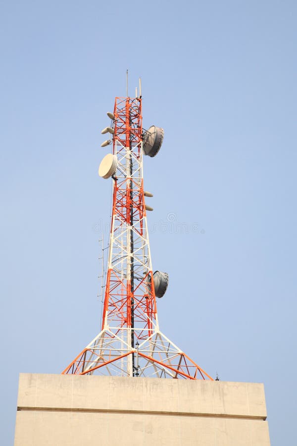 Telecom Tower on Top of Building Stock Photo - Image of pylon, network ...