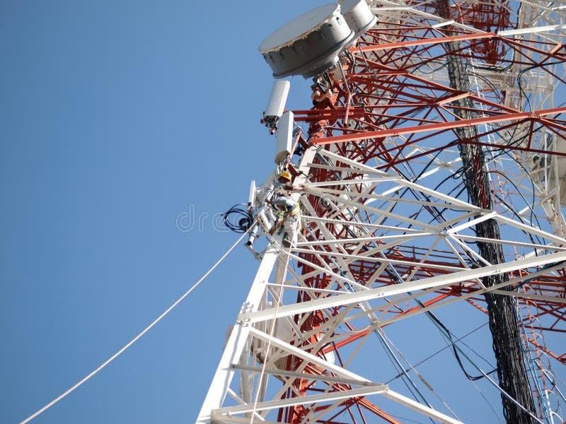 Telecom Workers Repairing Cables on Tower Stock Image - Image of ...