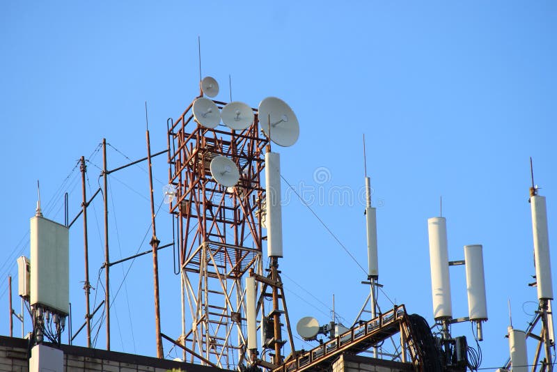 Telecommunication Base Stations Network Repeaters on the Roof of the ...