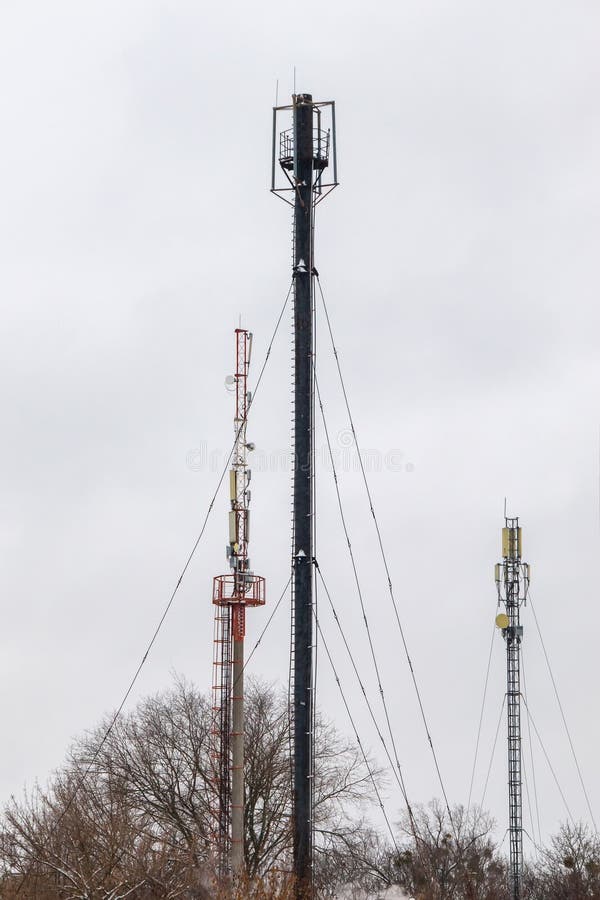 Telecommunication Cell Towers. Tall Poles with Antennas Stock Photo ...
