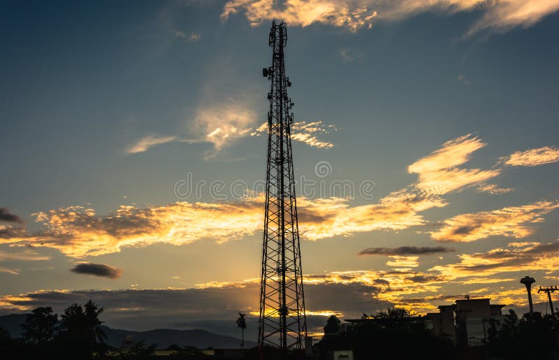 Telecommunication Cellular Tower in Sunset Sky Stock Photo - Image of ...