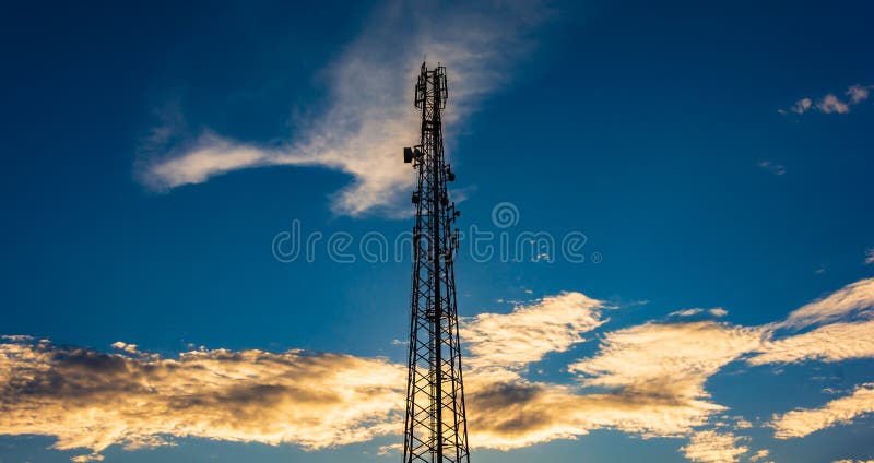 Telecommunication Cellular Tower in Sunset Sky Stock Photo - Image of ...
