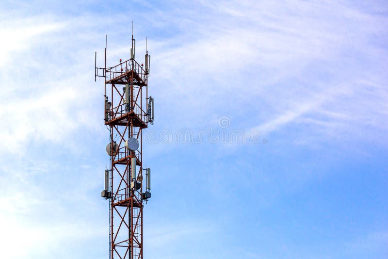 Telecommunication Tower Against the Blue Sky with Clouds. LTE, GSM, 2G ...