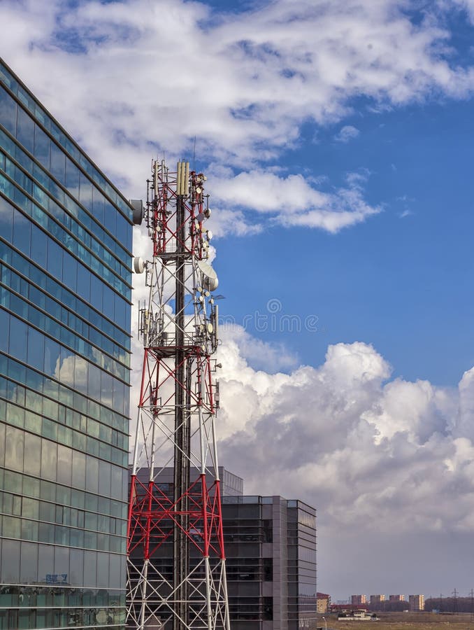 Telecommunication Tower Antenna and Modern Tall Buildings Stock Photo ...