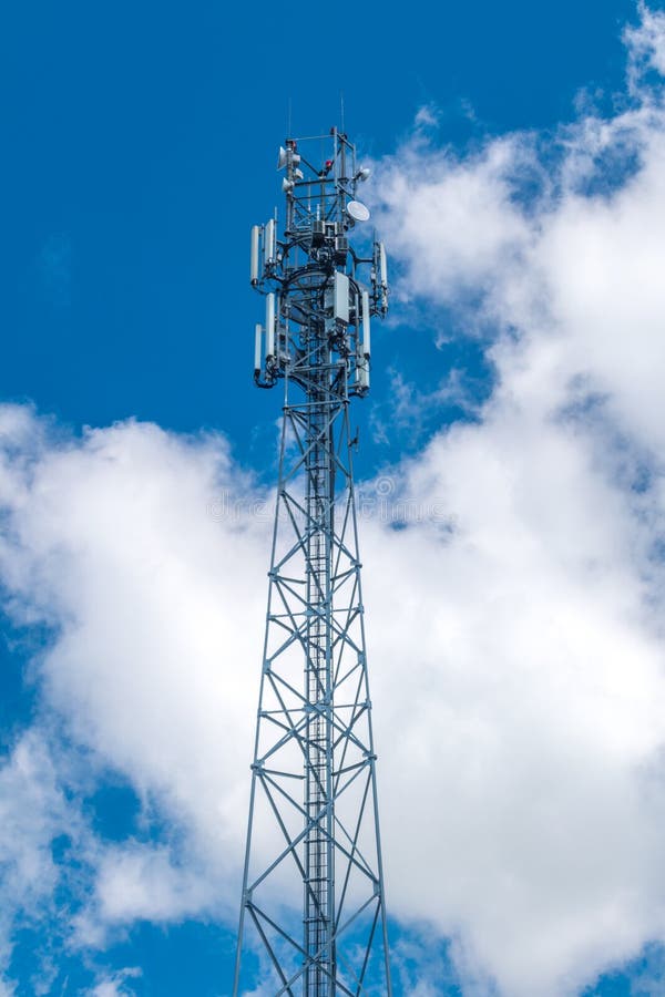 Telecommunication Tower on Blue Sky with Clouds Stock Image - Image of ...