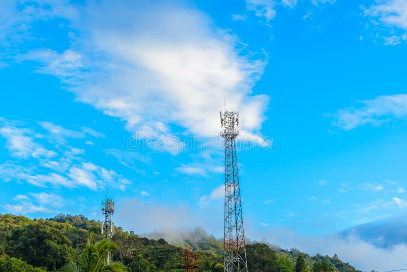 Telecommunication Tower. Cell Phone Signal Tower on Blue Sky Background ...