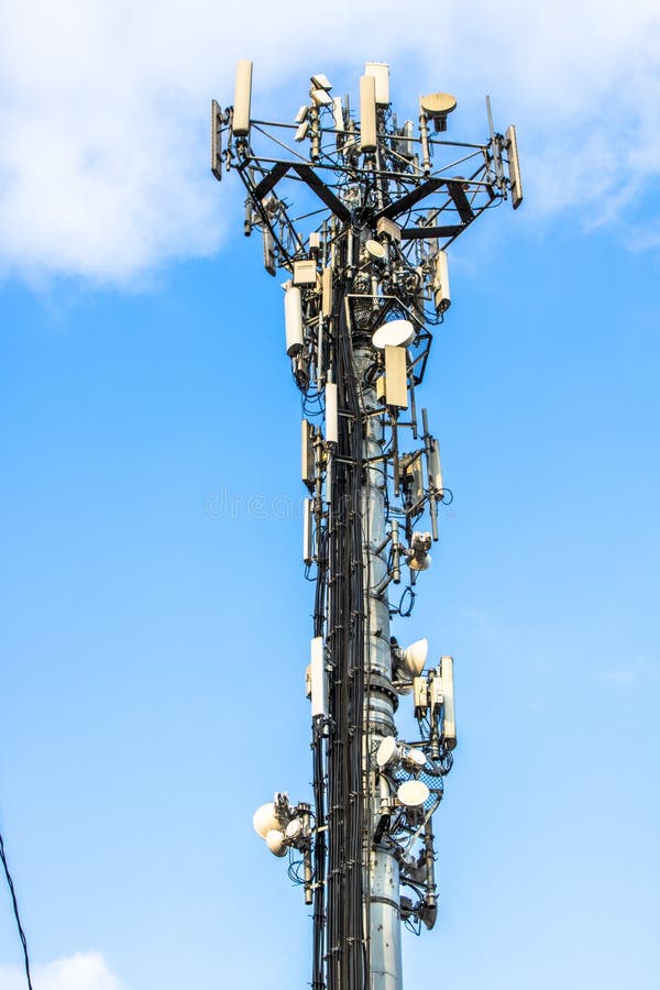 Telecommunication Tower with Copy Space in Roof Top of Building.Digital ...