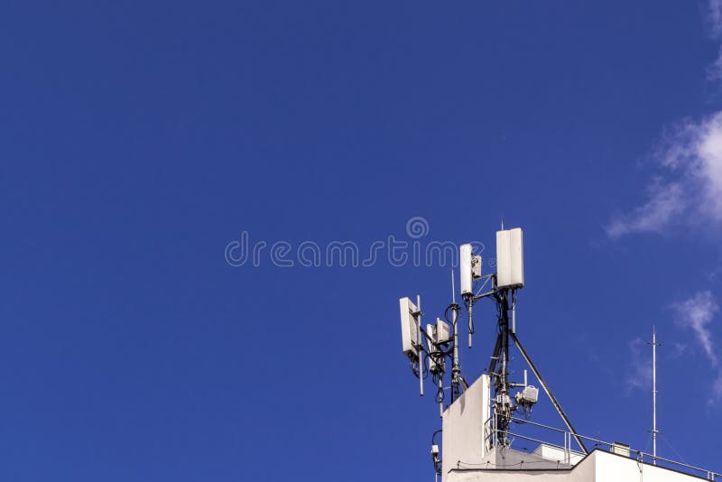 Telecommunication Tower with Copy Space in Roof Top of Building.Digital ...