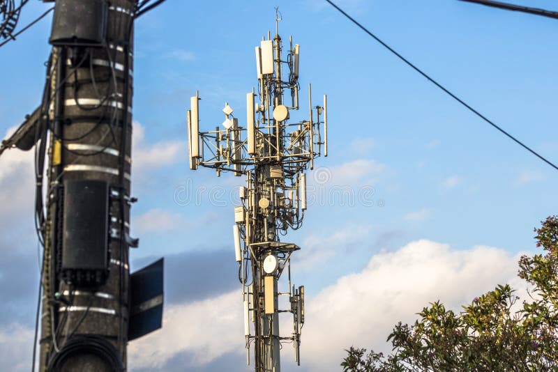 Telecommunication Tower with Copy Space in Roof Top of Building.Digital ...