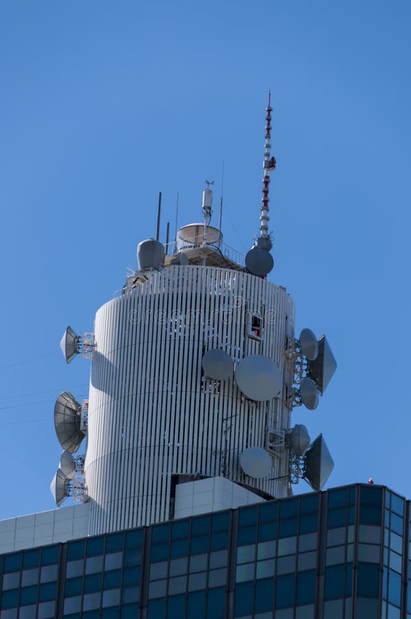 Telecommunication Tower for Mobile Phone with Antennas on a Roof Stock ...