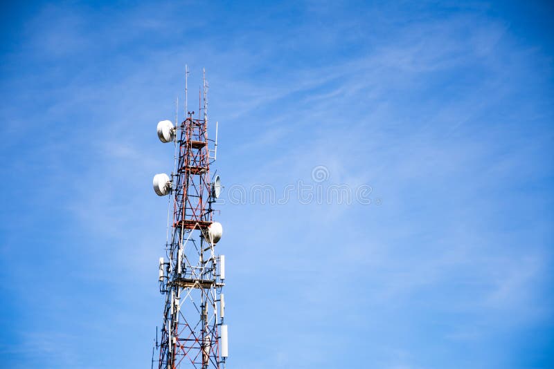 Telecommunication Tower Wireless Technology Against Blue Sky and Clouds ...