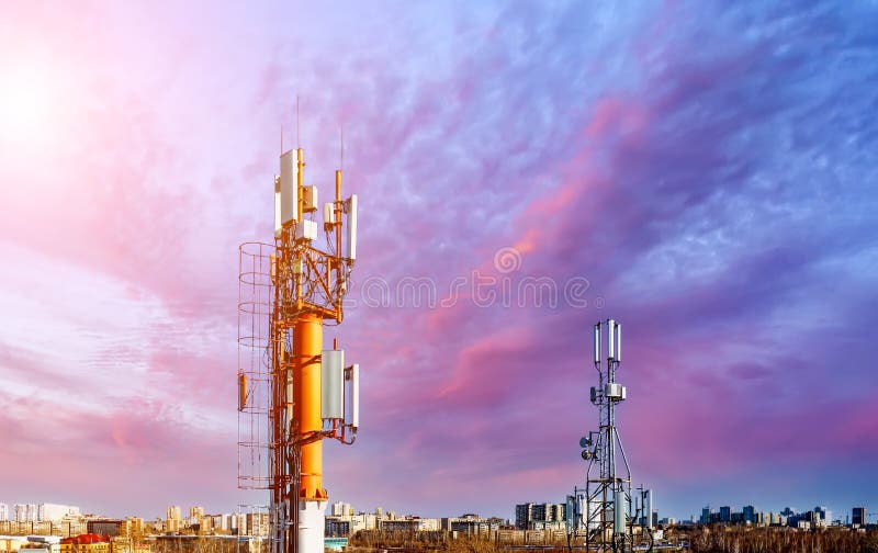 Telecommunication Towers with Blue Sky and White Clouds Background and ...