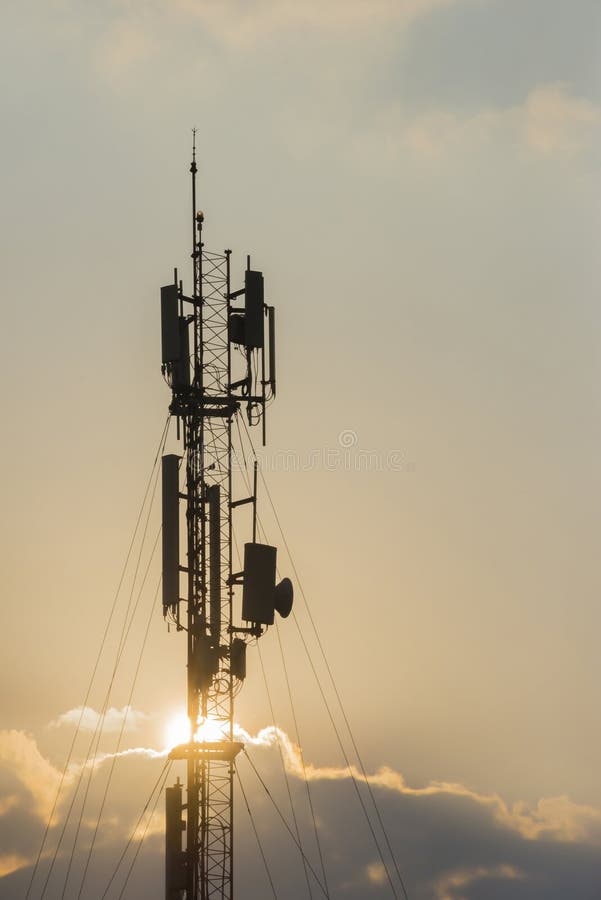 Telecommunication Towers with Colorful Sky Backgrounds at Sunset Stock ...