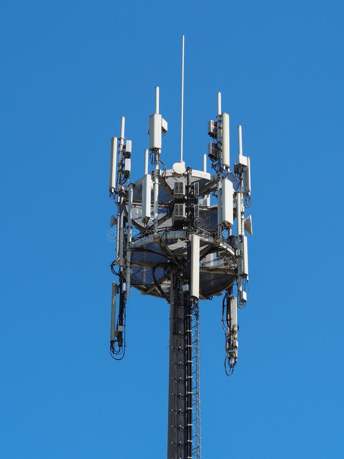Telecommunications Antennas on the Roof of a Concrete Building. Stock ...