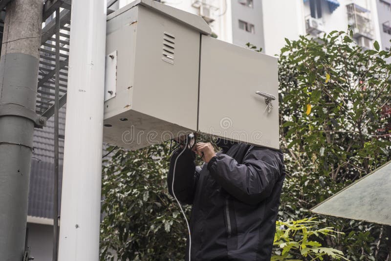 A Telecommunications Maintenance Worker is Checking Equipment Stock ...