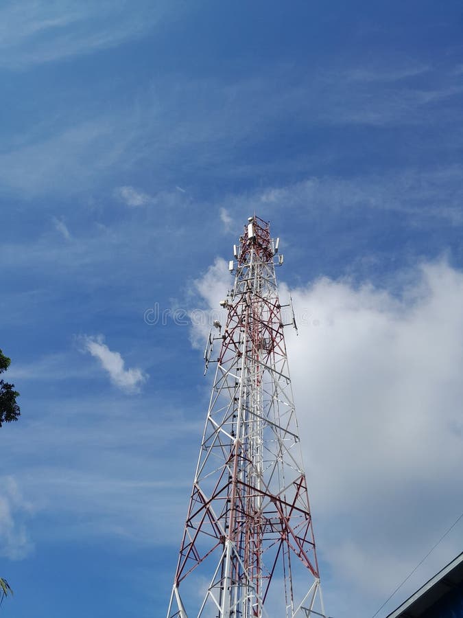A Telecommunications Network Tower in the Blue Sky that Looks so ...