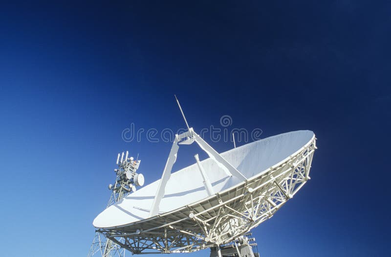 Telecommunications Satellite Dish and Communications Towers Stock Photo ...
