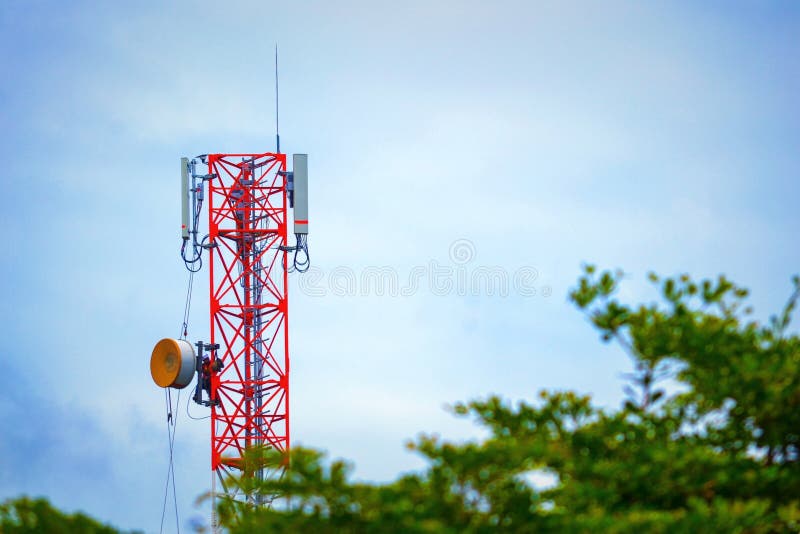 A Telecommunications Technician Fixes a Large Cylindrical Antenna ...