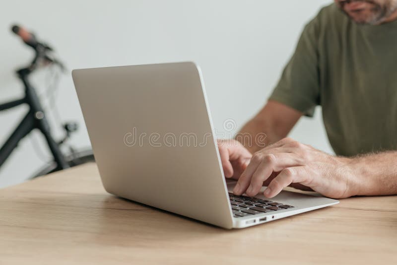 Telecommuter Typing Laptop Computer Keyboard in Home Office while ...