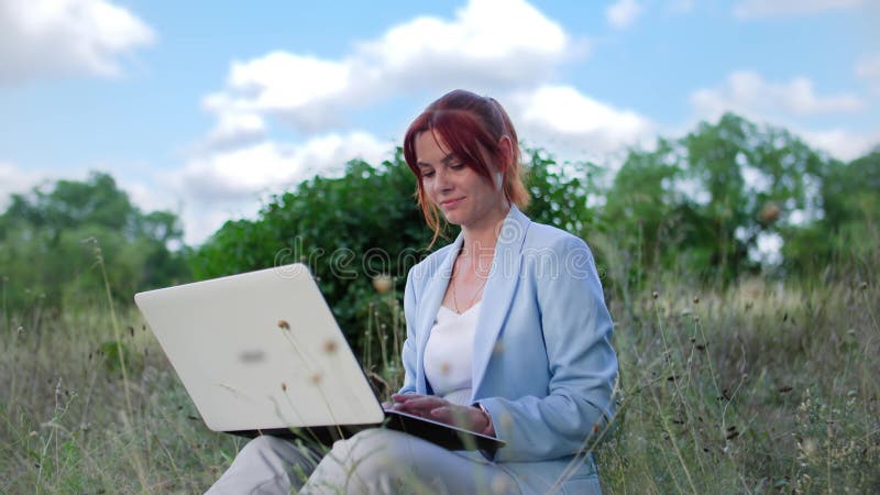 Telecommuting Office Worker, Charming Female Freelancer Working at the ...