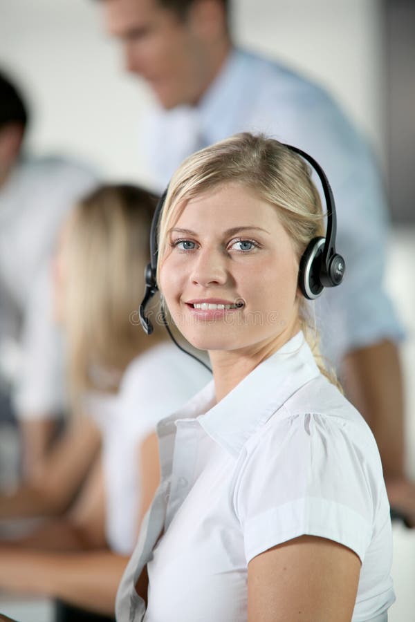 Telemarketer stock image. Image of sitting, group, looking - 16561385