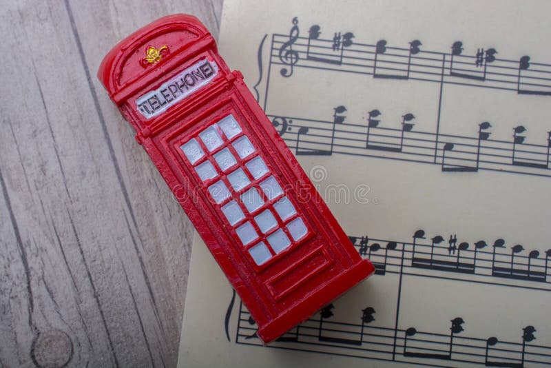 Telephone Booth Placed on Paper with Musical Notes Stock Photo - Image ...
